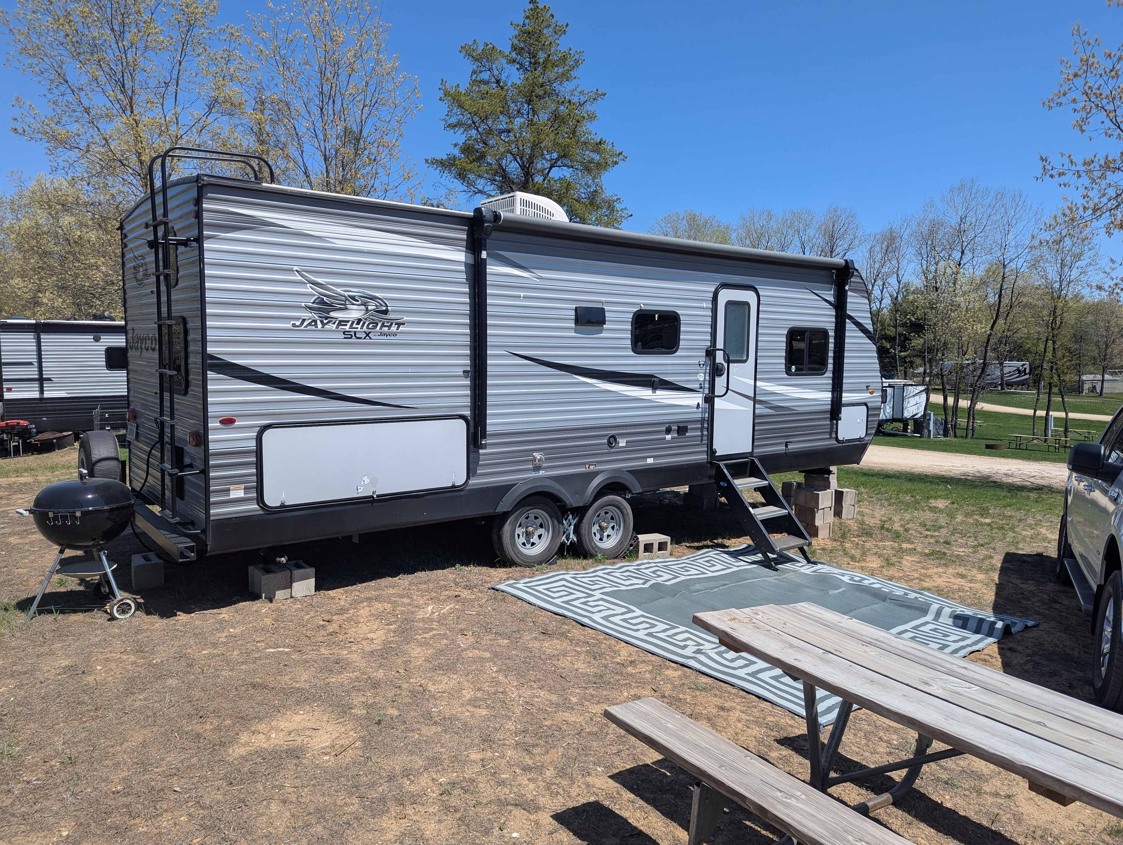 Camper At Emrick Lake Campground. - Hipcamp in Oxford, Wisconsin